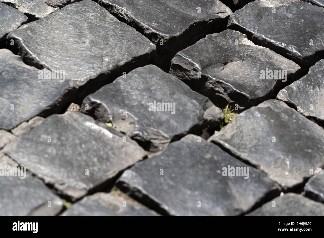 Sampietrini stone pavel road in rome Italy Stock Photo - Alamy