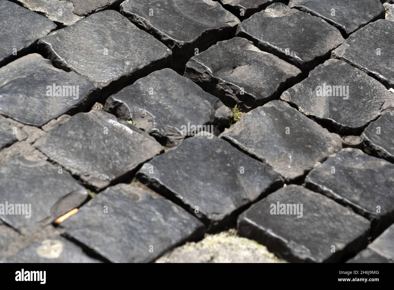 Sampietrini stone pavel road in rome Italy Stock Photo - Alamy