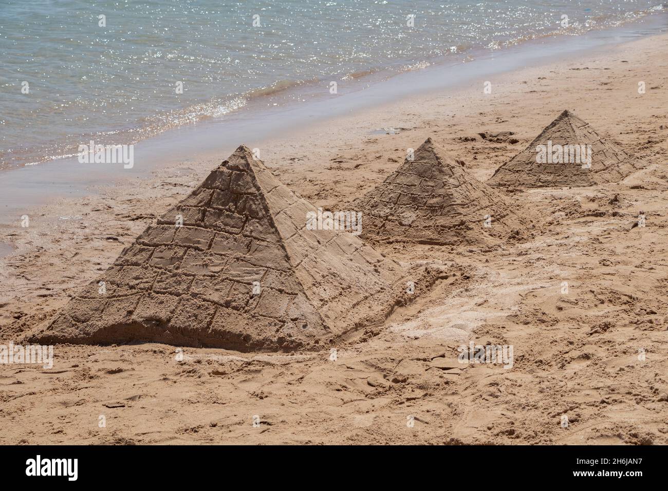 Sand pyramids on the beach in Hurghada Stock Photo - Alamy