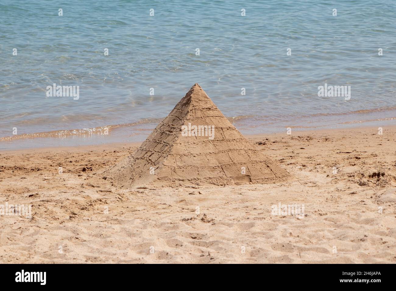 Sand pyramids on the beach in Hurghada Stock Photo - Alamy