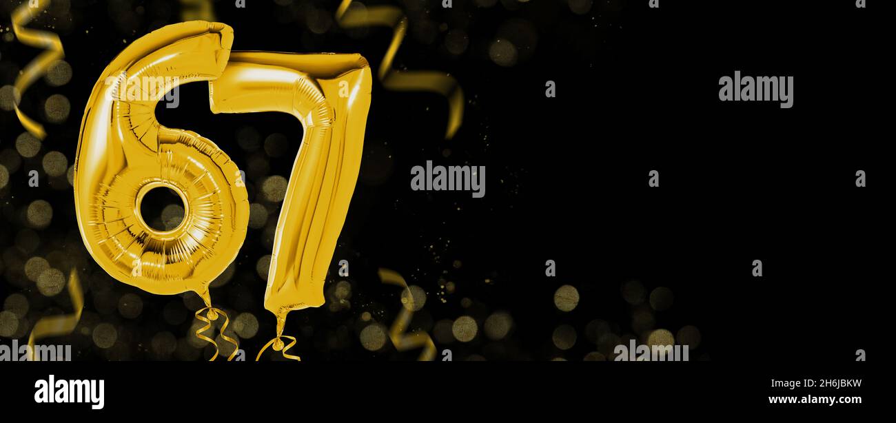 Golden balloons with copy space - Number 67 Stock Photo - Alamy