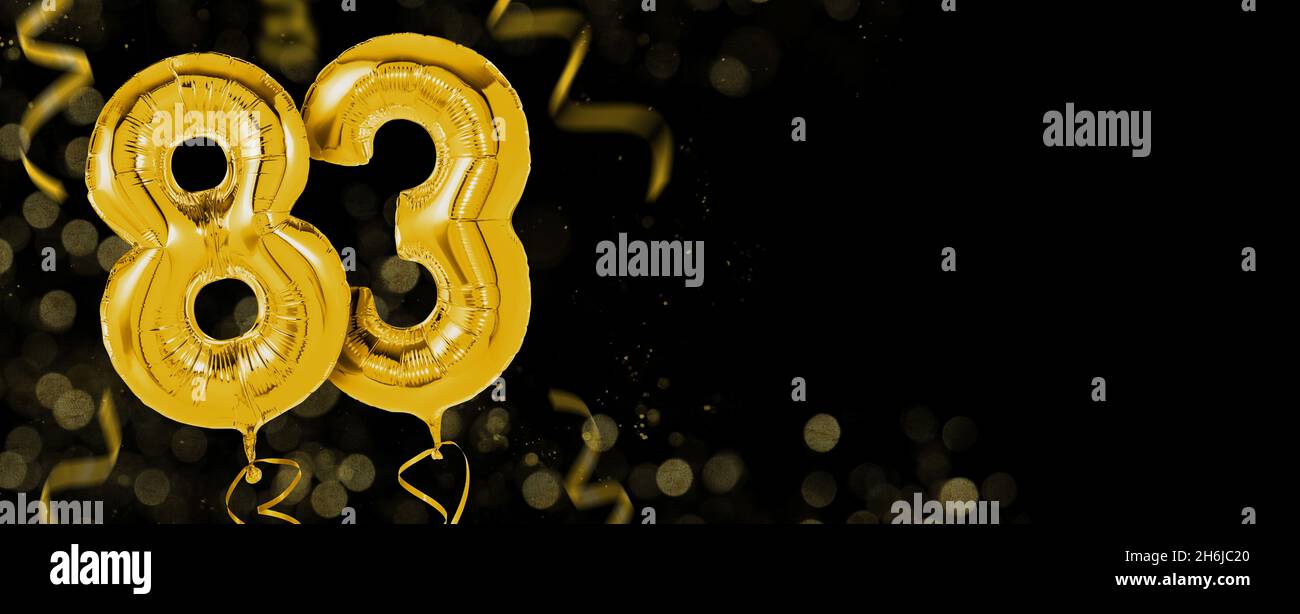 Golden balloons with copy space - Number 83 Stock Photo - Alamy