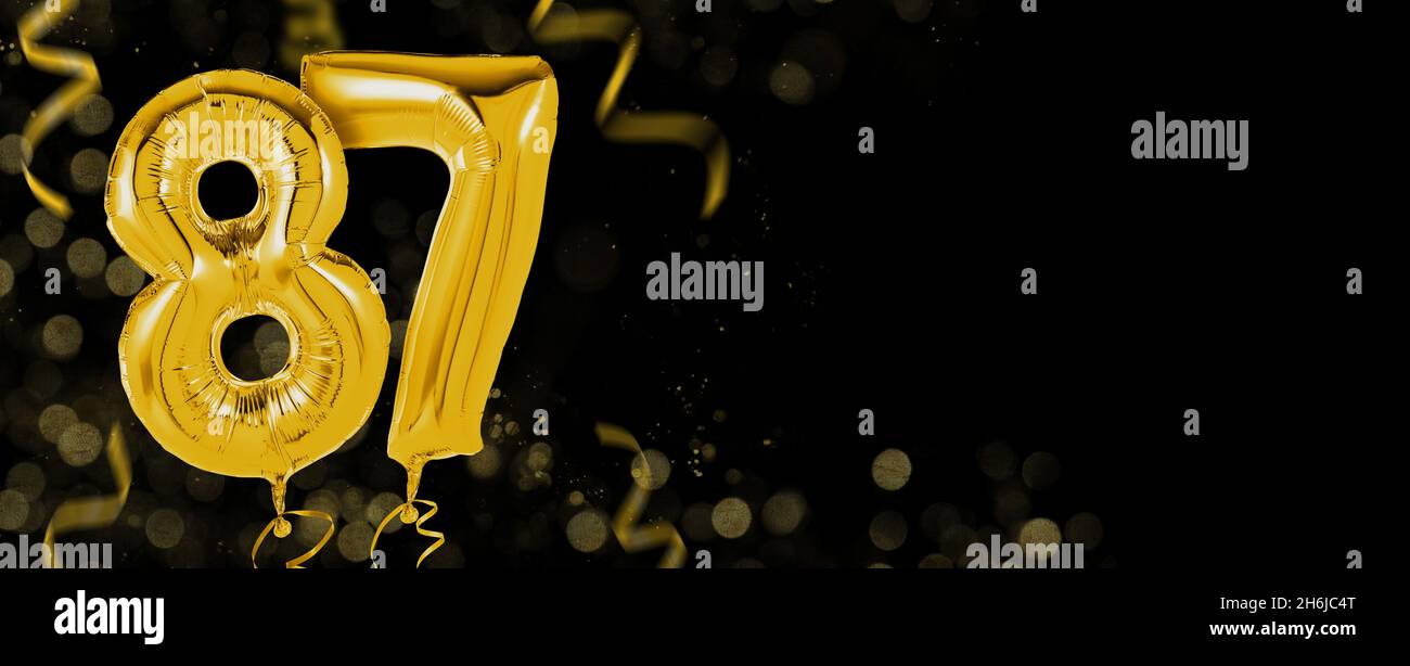 Golden balloons with copy space - Number 87 Stock Photo - Alamy