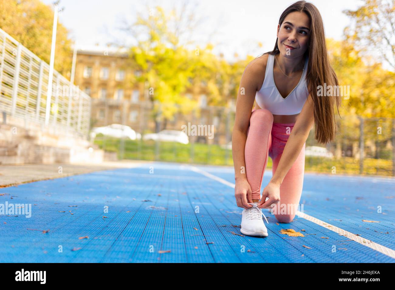 Tying sneaker laces hi-res stock photography and images - Alamy