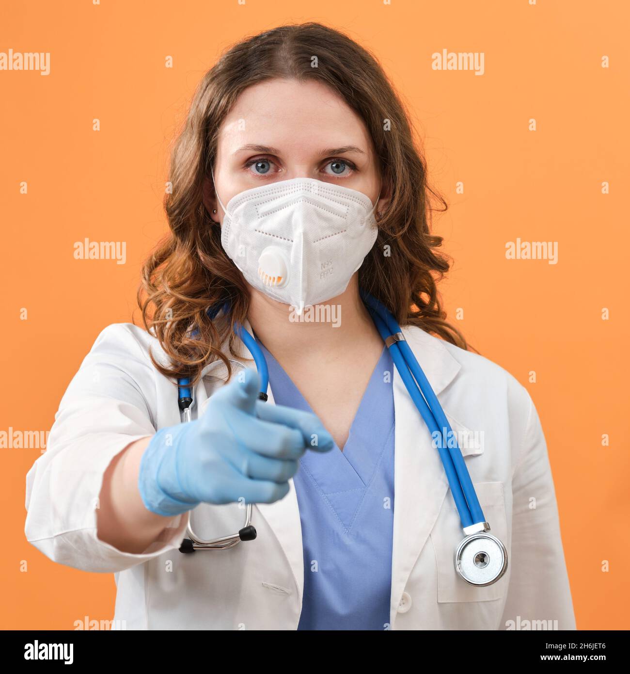 Doctor points finger forward hi-res stock photography and images - Alamy