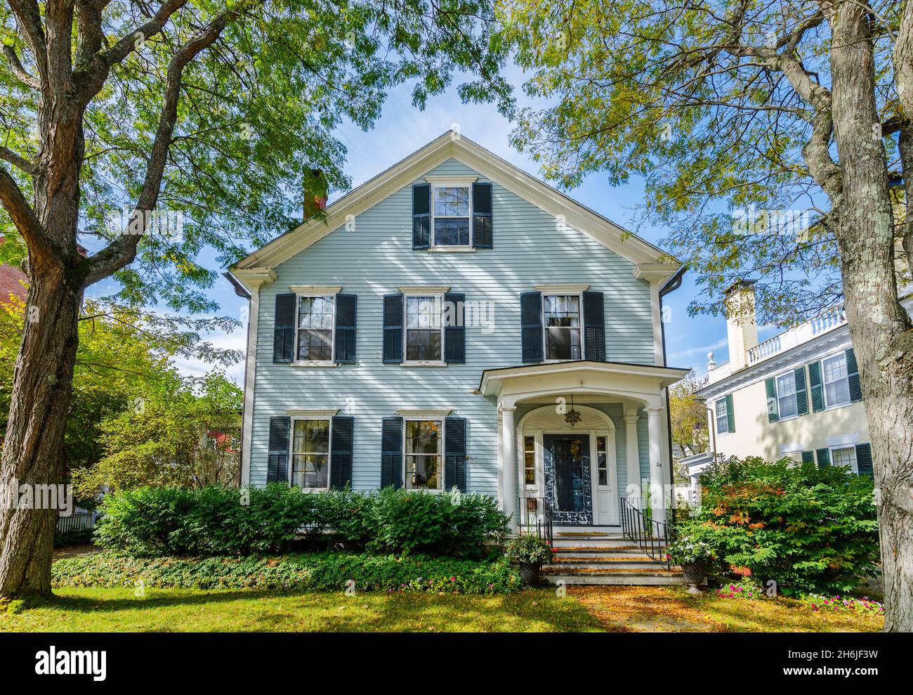 Typical local style architecture, a large upscale light blue painted ...