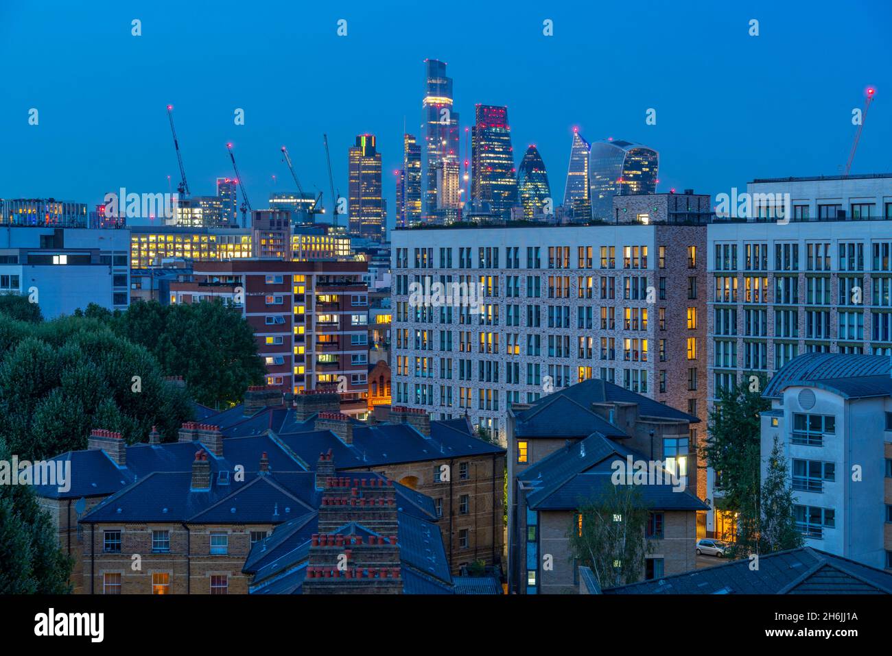 View of London skyline and City of London from Waterloo at dusk ...
