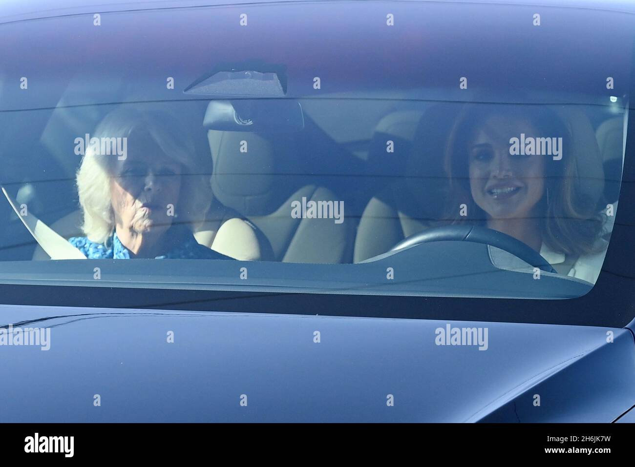 Queen Rania Al-Abdullah driving the Duchess of Cornwall in a Tesla for ...