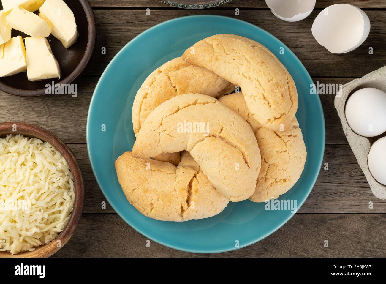 Chipas, typical south american cheese bun over wooden table with ...