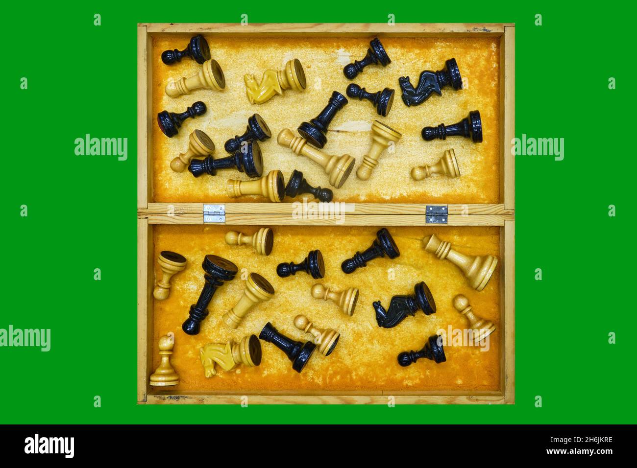 An inverted old chessboard for collecting retro pieces after the game ...