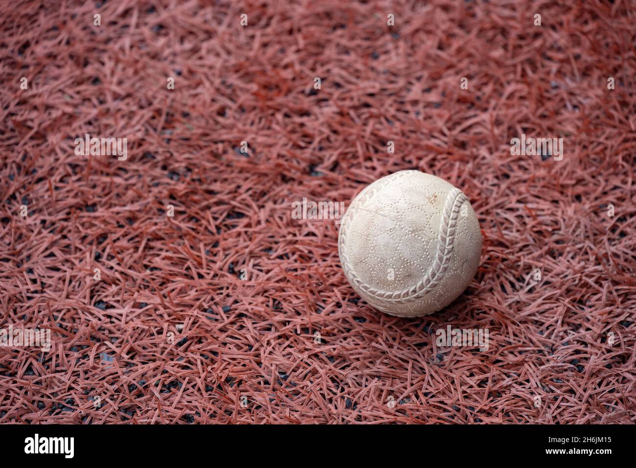 baseball ball on the ground Stock Photo - Alamy