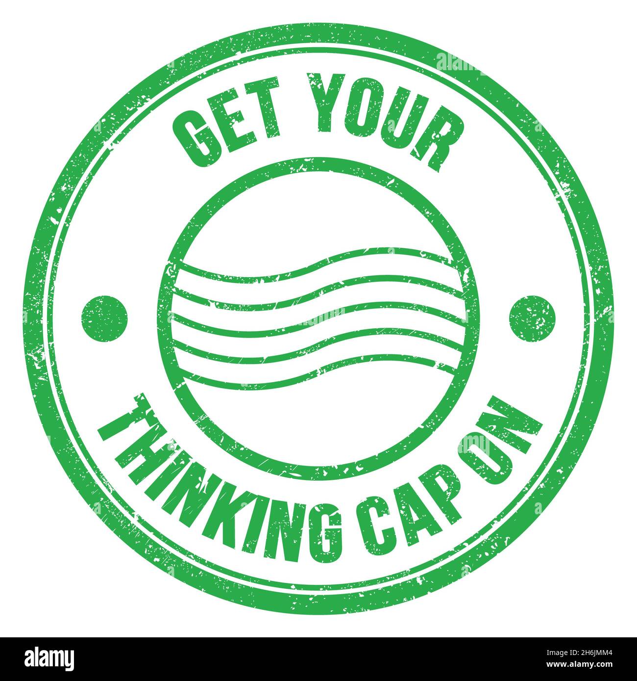 GET YOUR THINKING CAP ON text written on green round postal stamp sign ...
