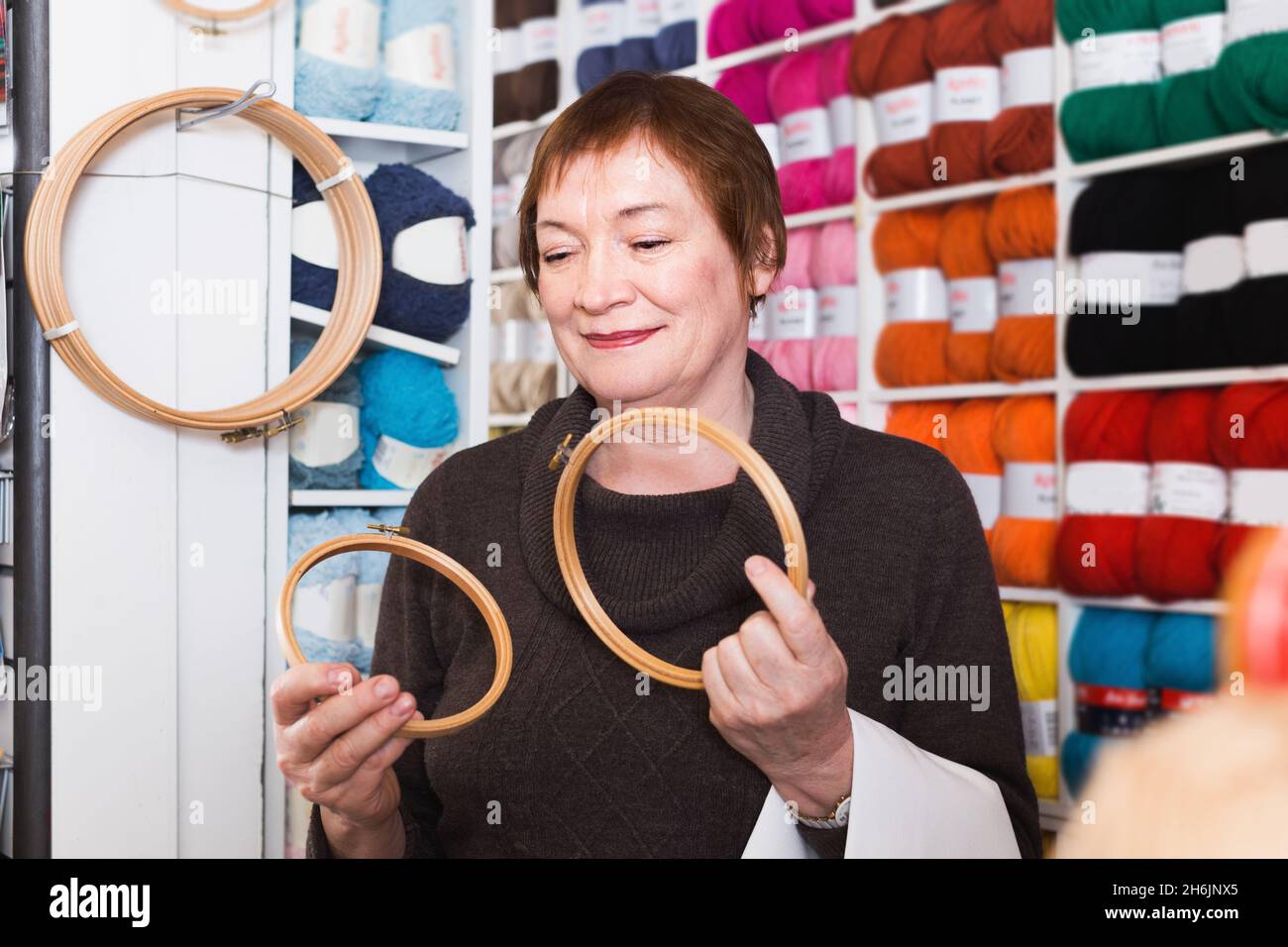 Senior woman choosing yarn hi-res stock photography and images - Alamy