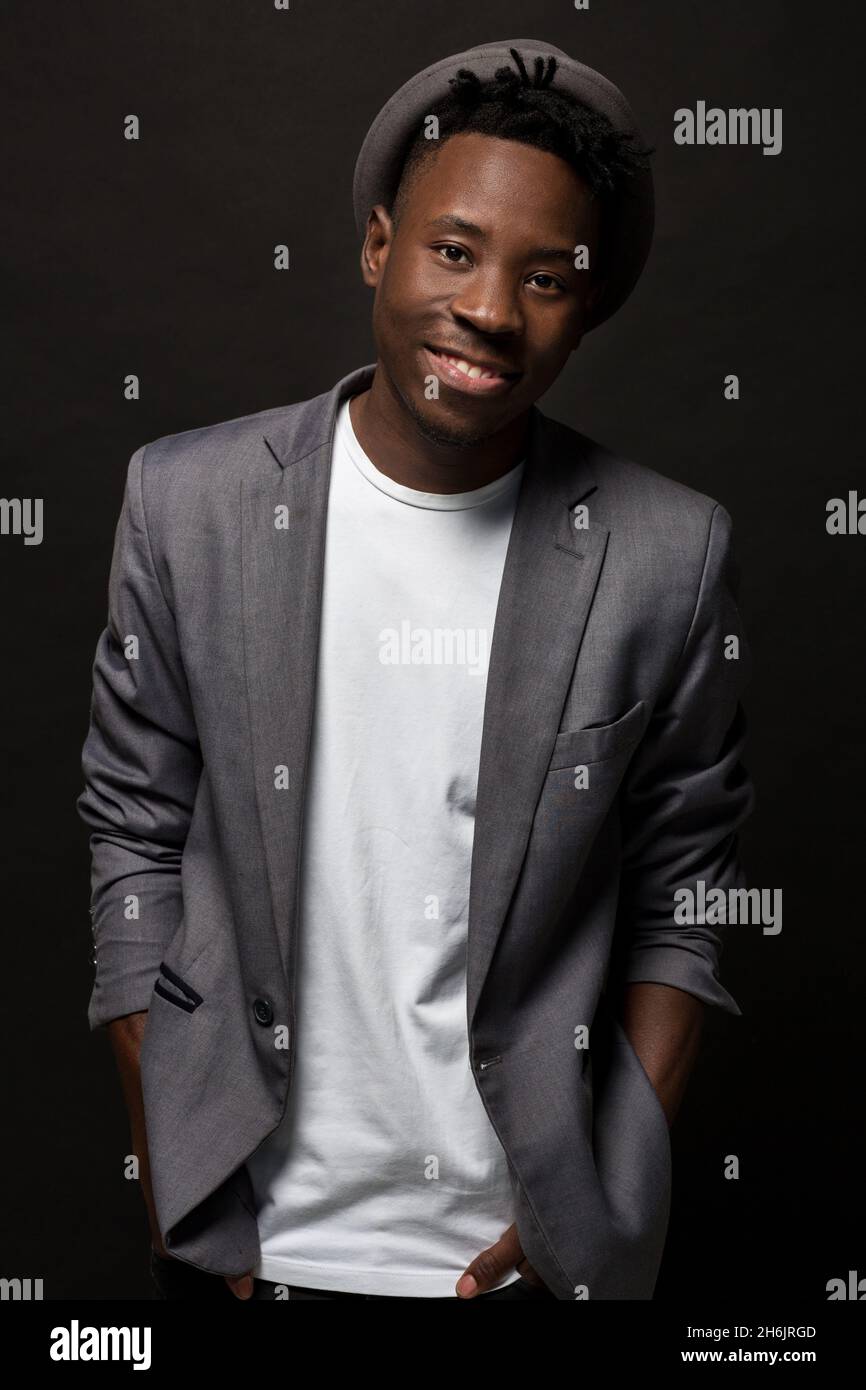 Close-up portrait of handsome black man with charming smile. Studio ...