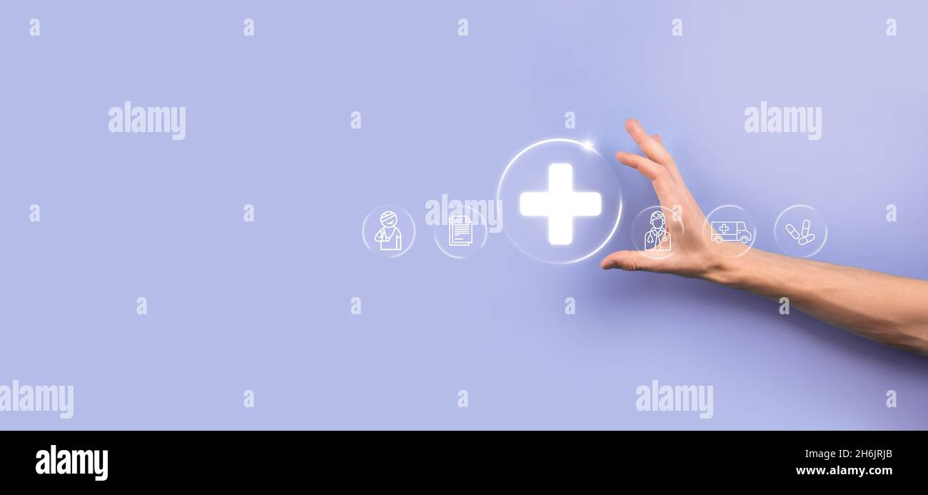 Businessman hold virtual plus medical network connection icons. Covid ...