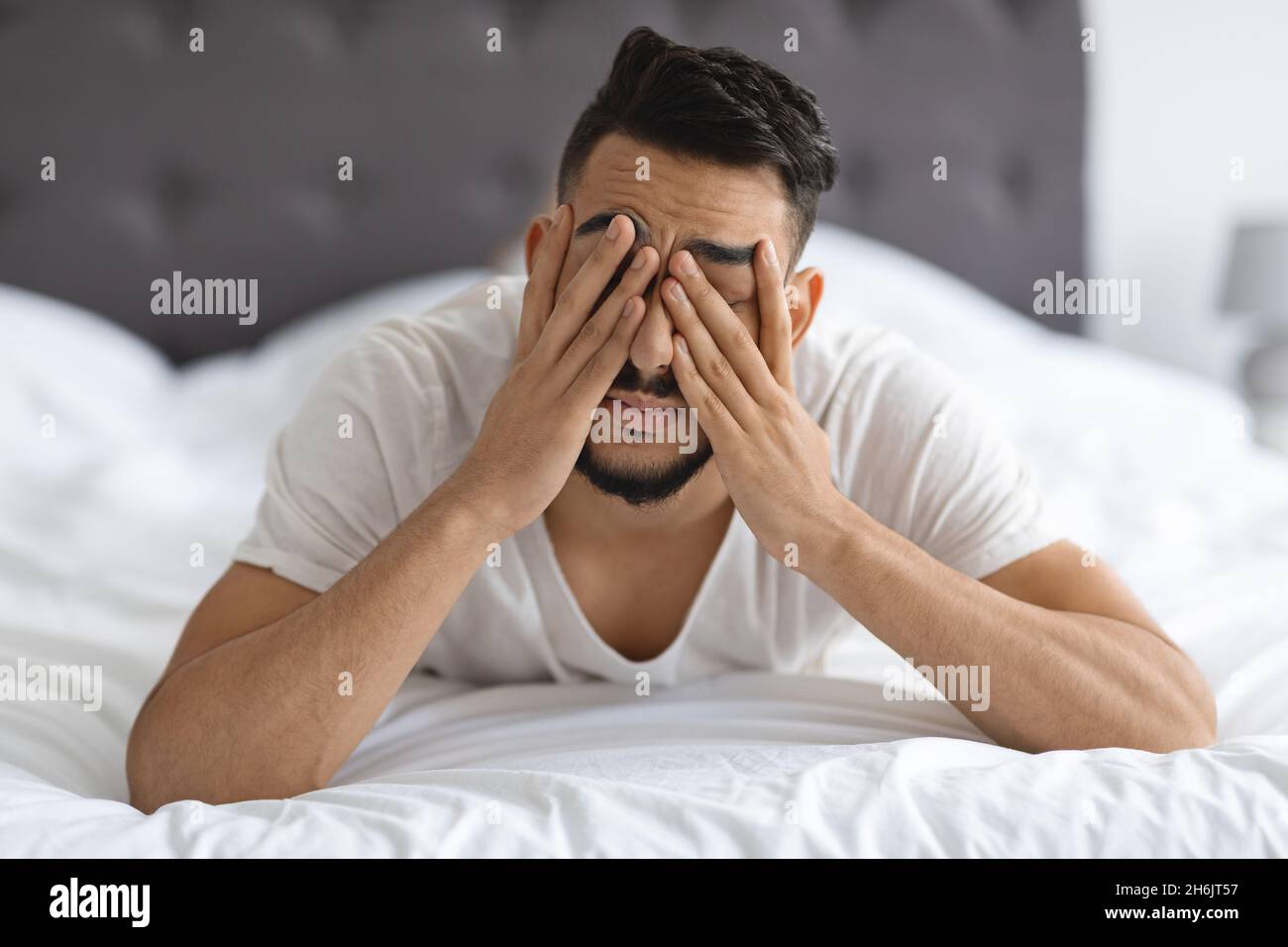 Man waking up in bed hi-res stock photography and images - Alamy