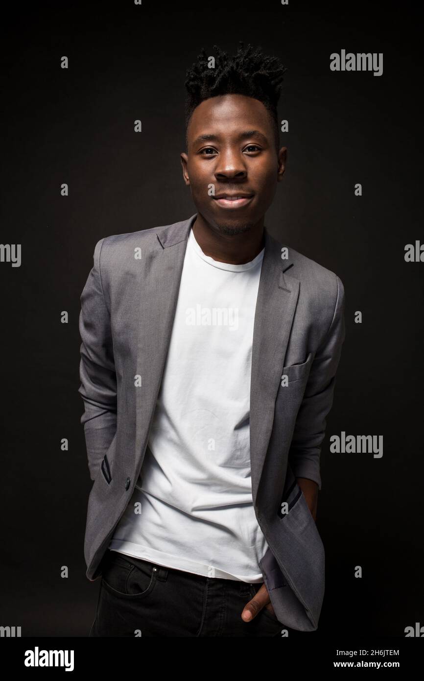 Close-up portrait of handsome black man with charming smile. Studio ...