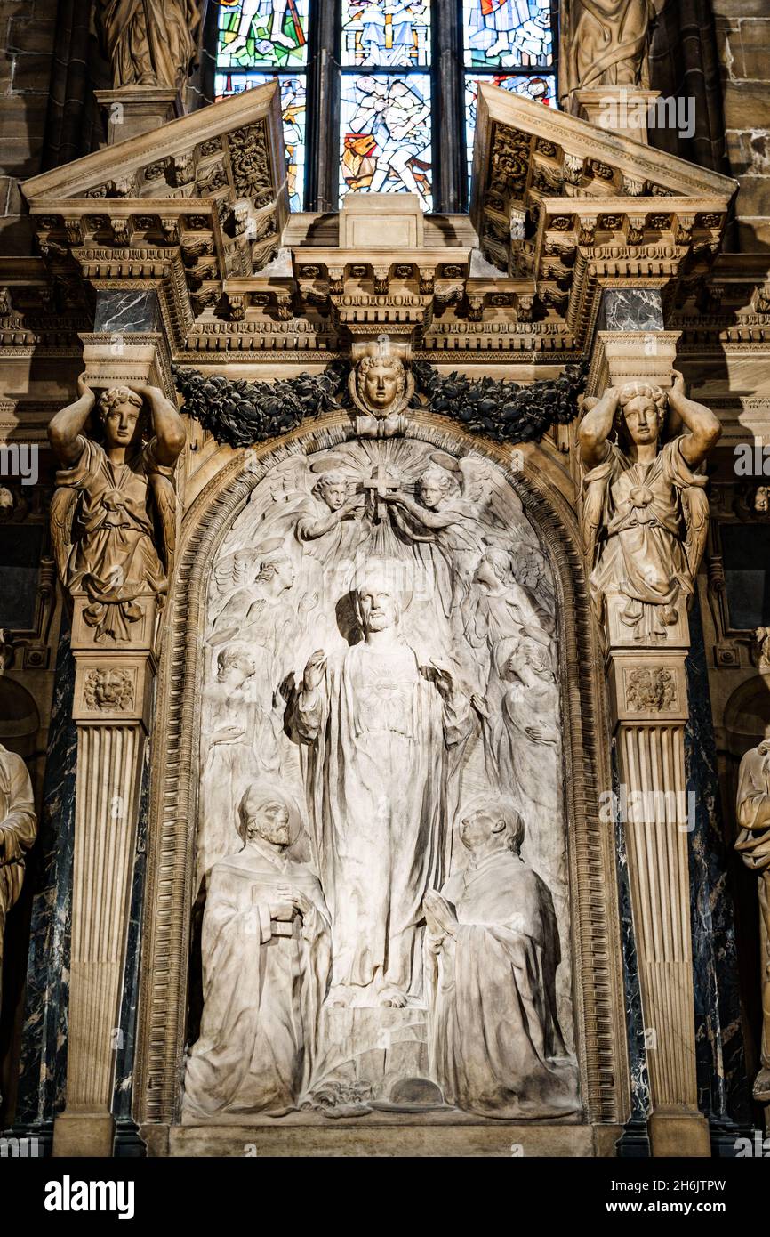 Statue of Jesus Christ surrounded by angels in the Duomo. Milan, Italy ...