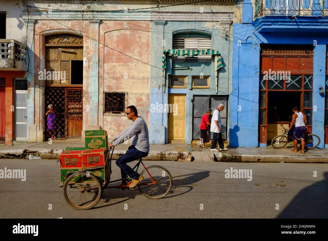 Bicycles and pedestrians on the street, Cardenas, Matanzas, Cuba, West ...