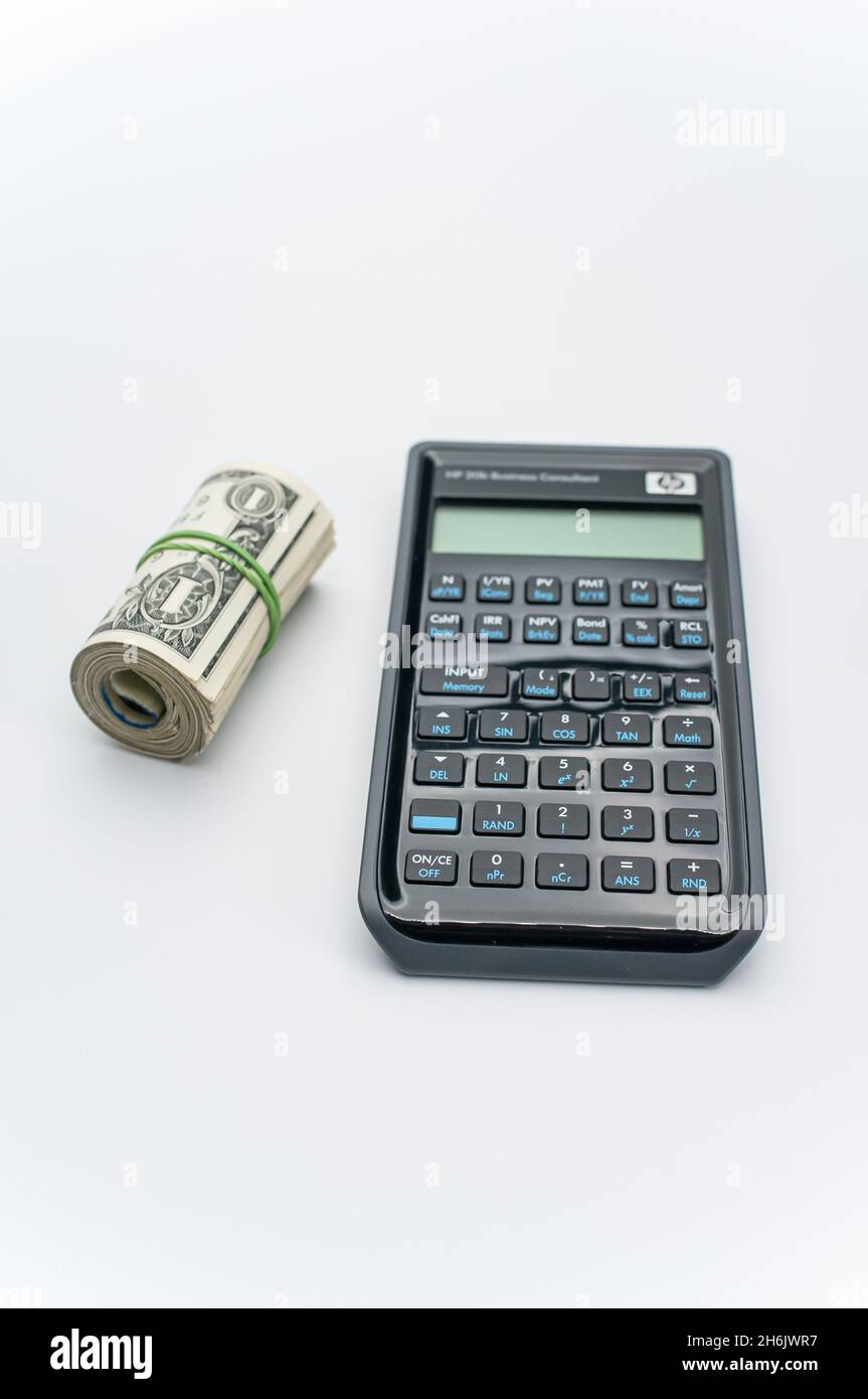 MILAN, ITALY - Nov 10, 2021: compact business calculator and US dollars ...