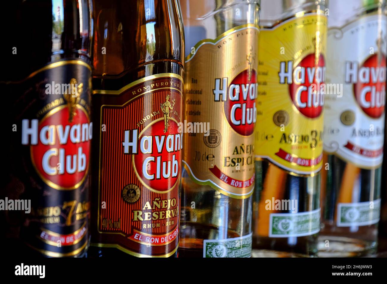 Havana Club bottles lined up at a bar, Cienfuegos, Cuba, West Indies ...