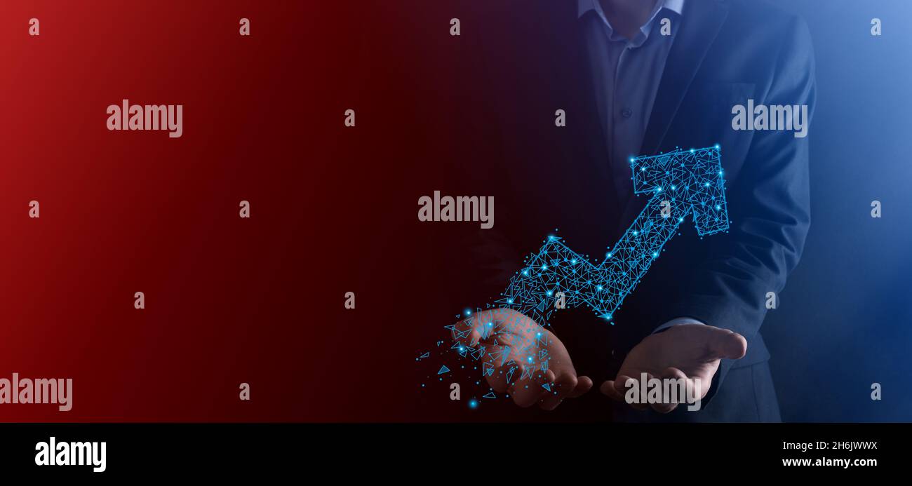 Businessman hold graph, arrow of positive growth icon.pointing at ...