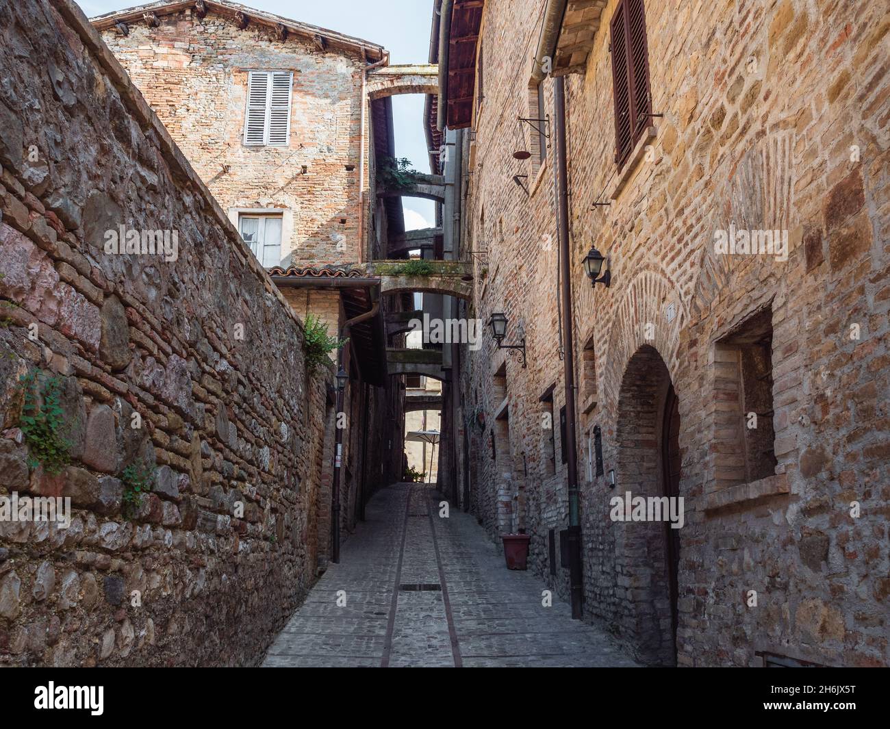 A typical street full of arches in Montefalco's old town, Montefalco ...