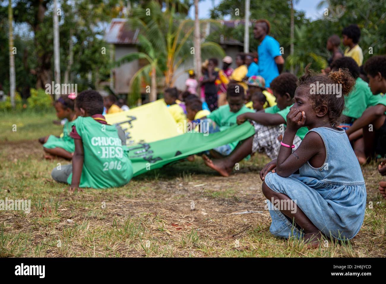 CHUCHULU VILLAGE, SOLOMON ISLANDS - Jan 01, 2016: Children gather at a ...