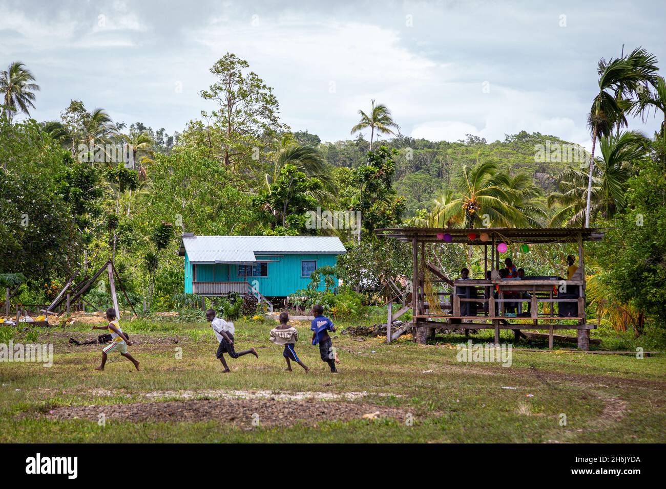 CHUCHULU VILLAGE, SOLOMON ISLANDS - Jan 01, 2016: Children gather at a ...