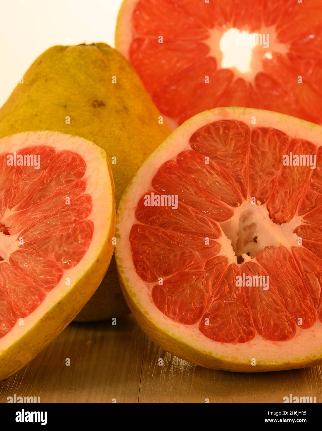 The photo shows a round piece, a pomelo slice. The inside of the exotic ...