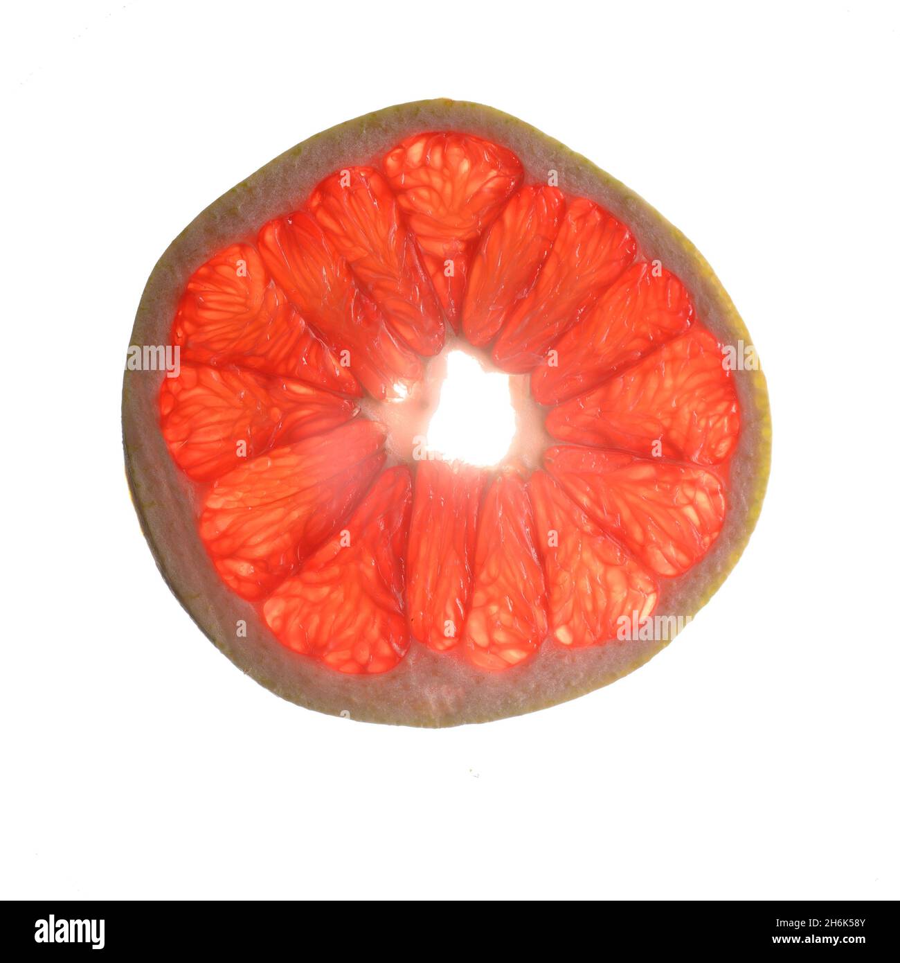 The photo shows a round piece, a pomelo slice. The inside of the exotic ...