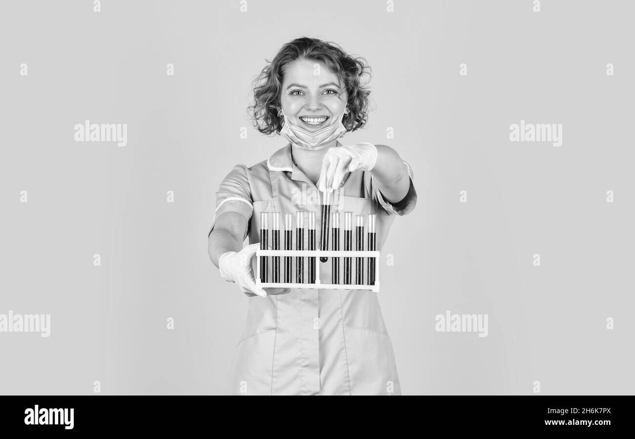 Woman doctor checking blood Black and White Stock Photos & Images - Alamy