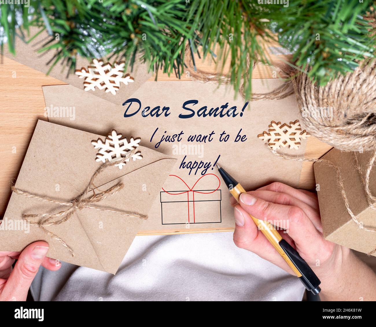 Santa claus holding a beautiful christmas gift box hi-res stock ...