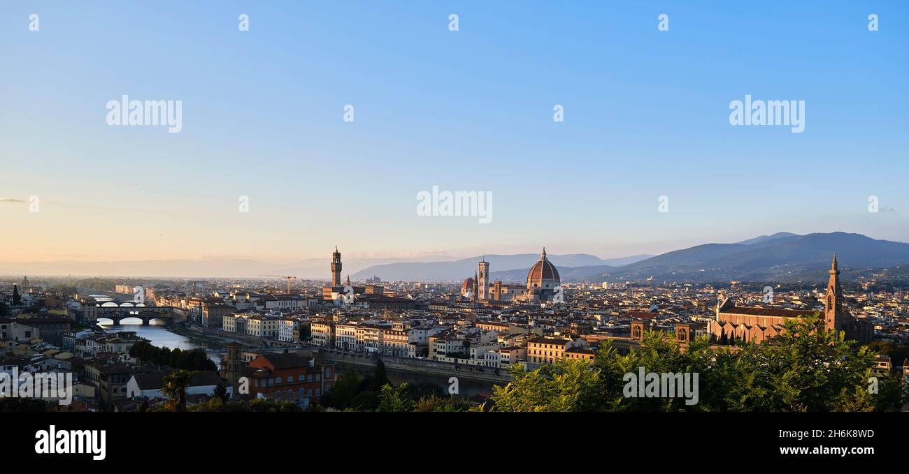 a view of the sunset in Firenze (Florence) from the high with the Arno ...
