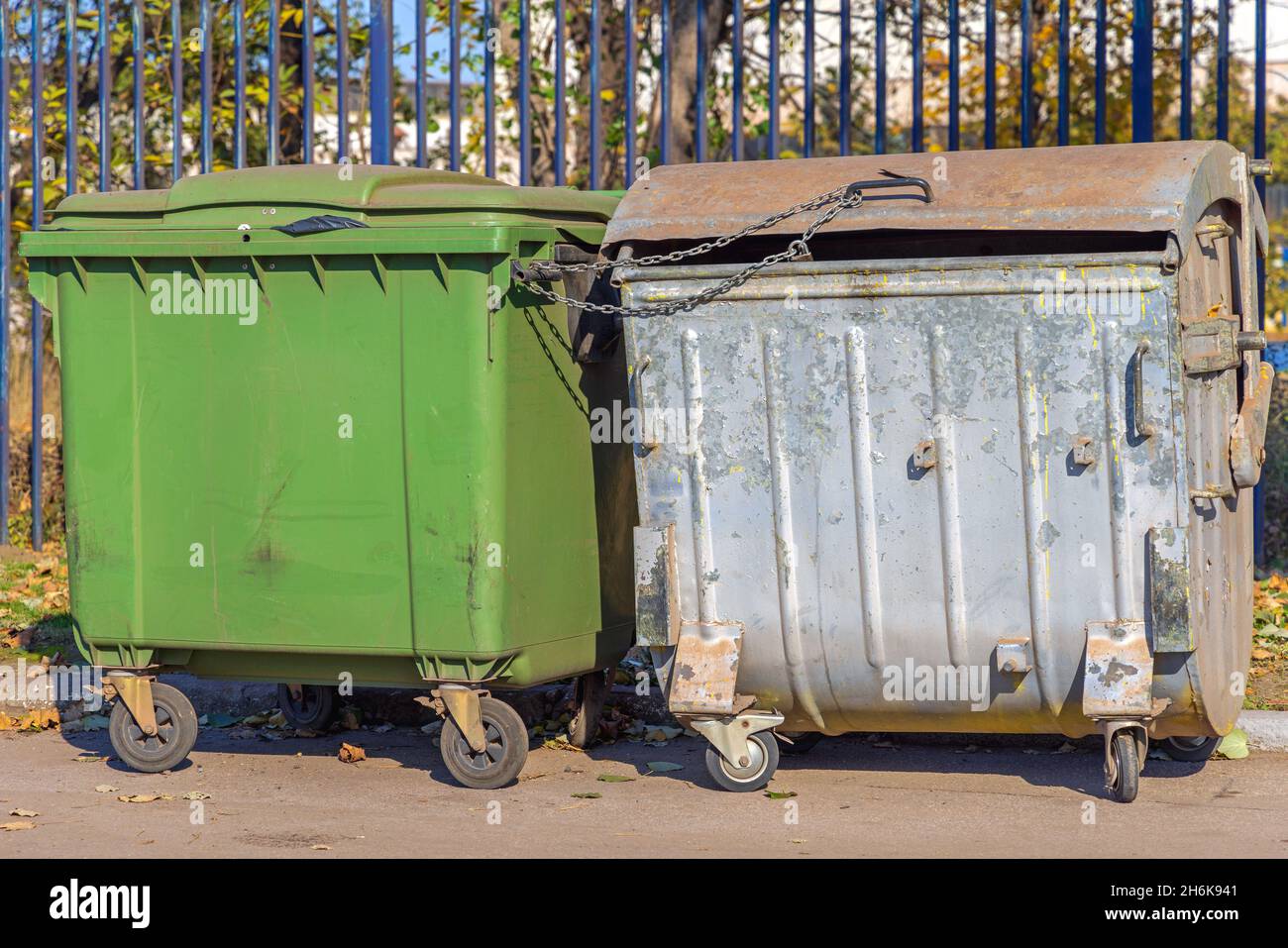 Two Dumpster Bins Chained to Each Other Stock Photo - Alamy