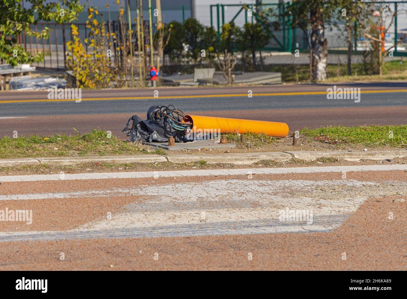 Fallen Down Traffic Light Pole Accident at City Street Stock Photo - Alamy