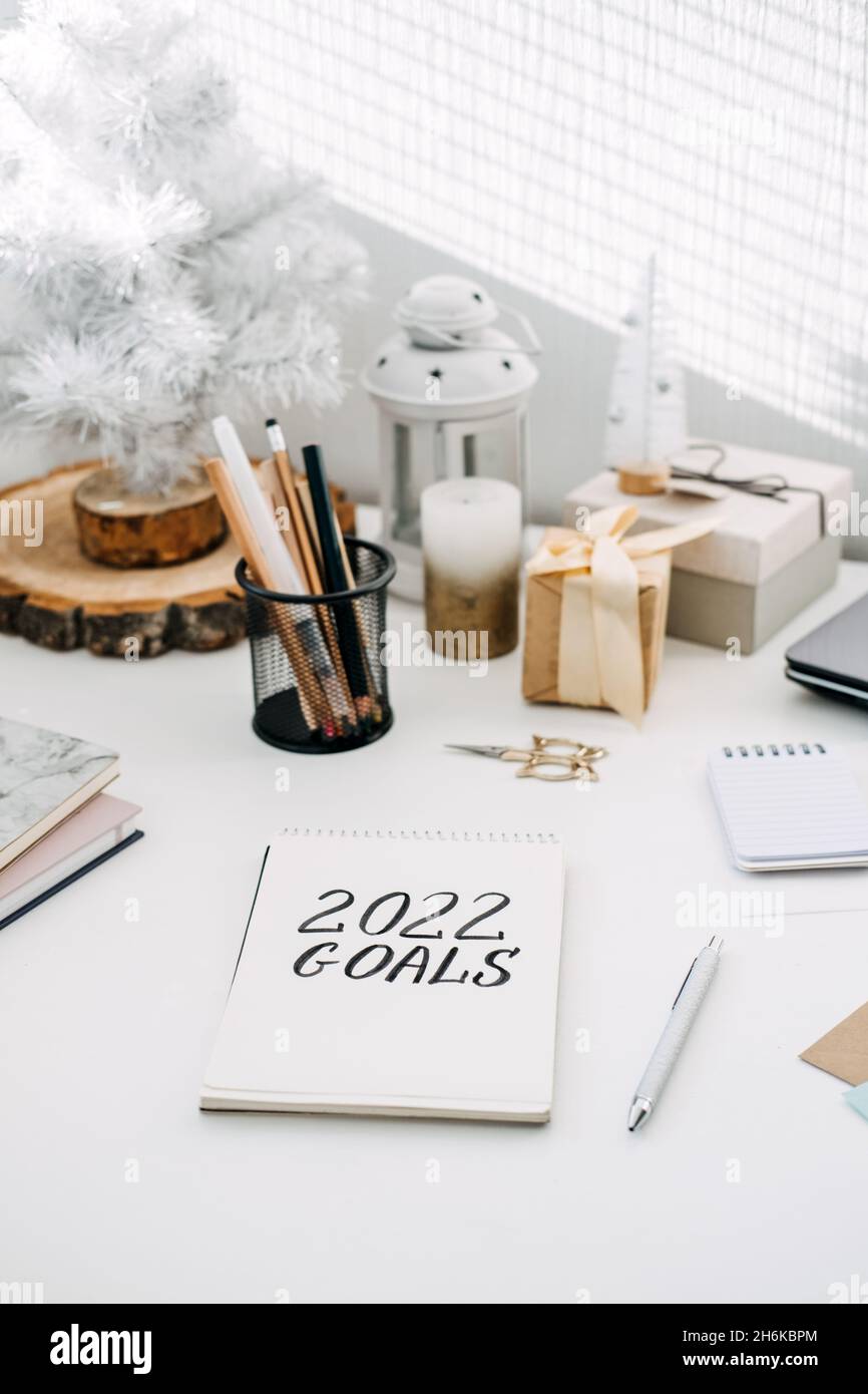 2022 goals, New year resolution. Text 2022 goals in open notepad on the ...