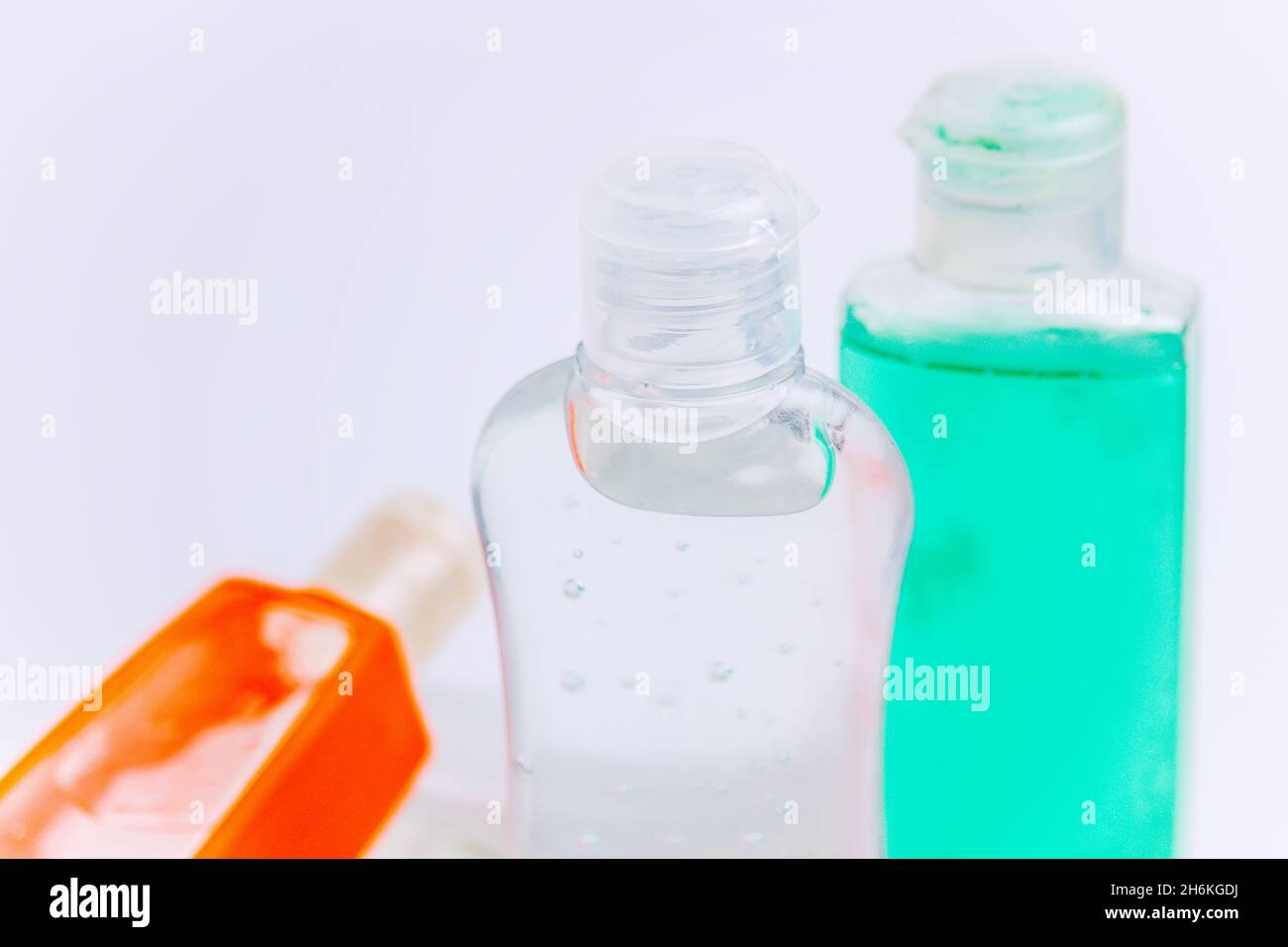 Closeup shot of gel alcohol containers with different sizes isolated on ...