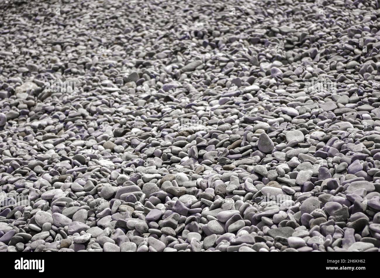 Surface covered with small gray pebbles Stock Photo - Alamy