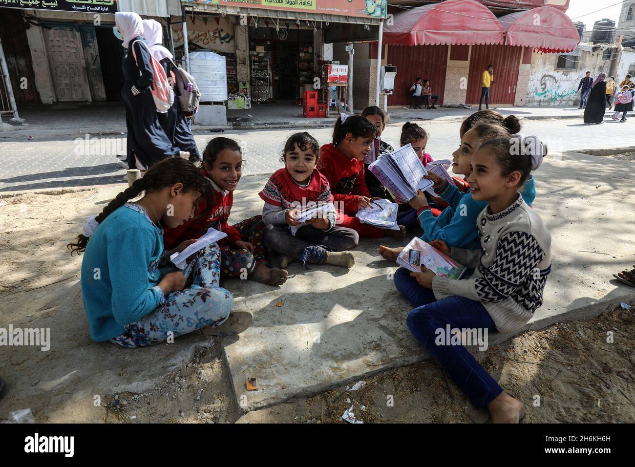 Palestinians on the street of Rafah refugee camp in the southern Gaza ...