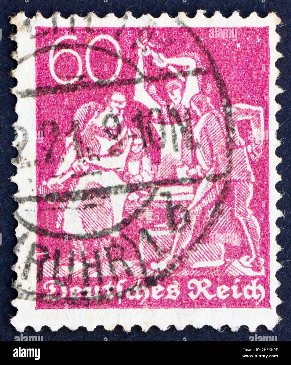 GERMANY - CIRCA 1921: a stamp printed in the Germany shows Iron Workers ...