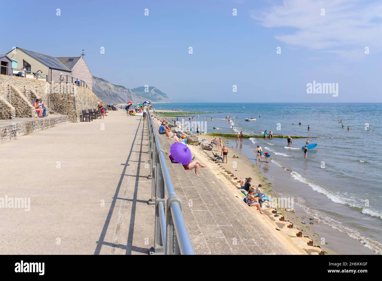 Charmouth Dorset Families on the beach and breakwater near the ...