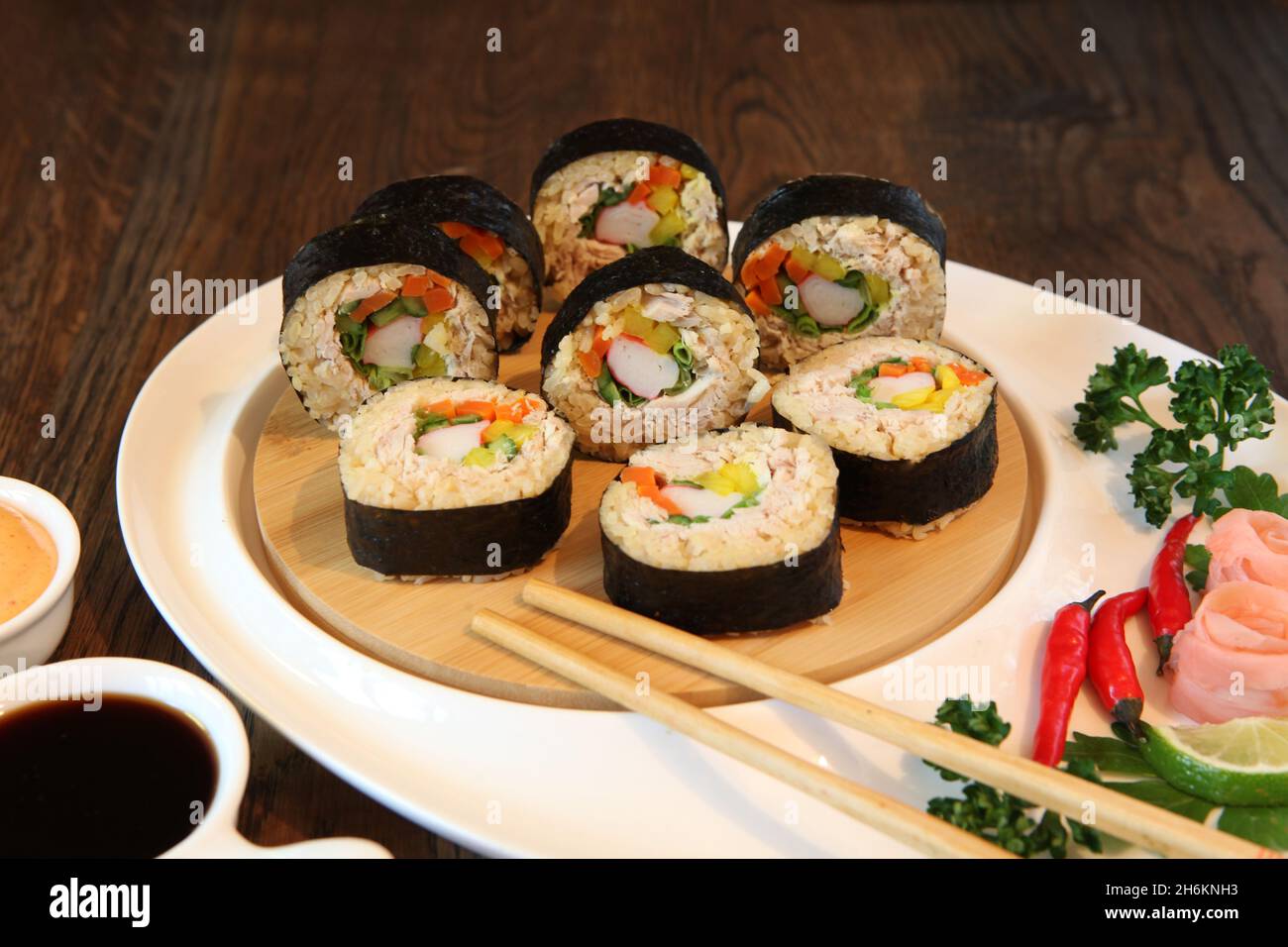 hot roll set sashimi japanese food on wooden background Stock Photo - Alamy