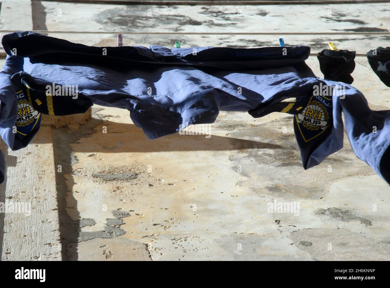Uniform washing line hi-res stock photography and images - Alamy