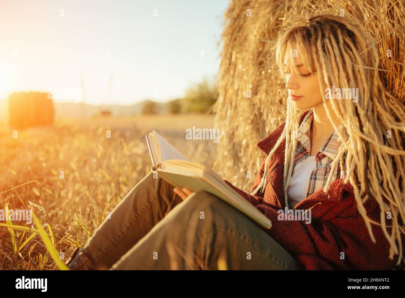 Beautiful young woman learns hi-res stock photography and images - Alamy
