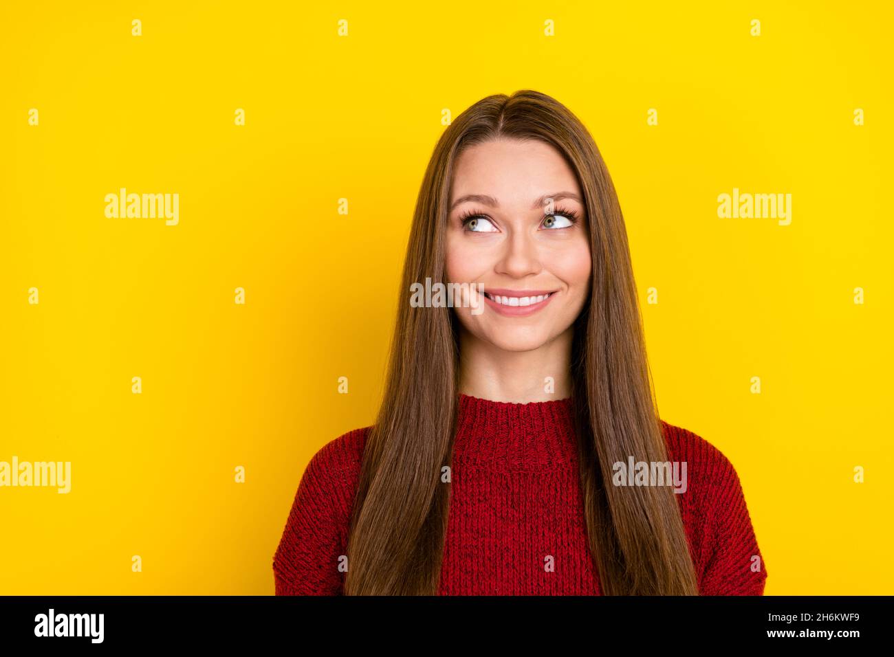 Photo of cheerful young happy woman look empty space curious smile ...