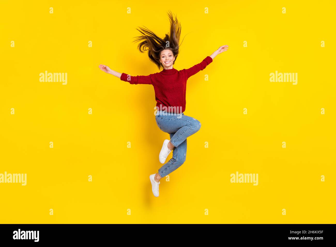 Full size photo of young attractive woman happy positive smile jump ...