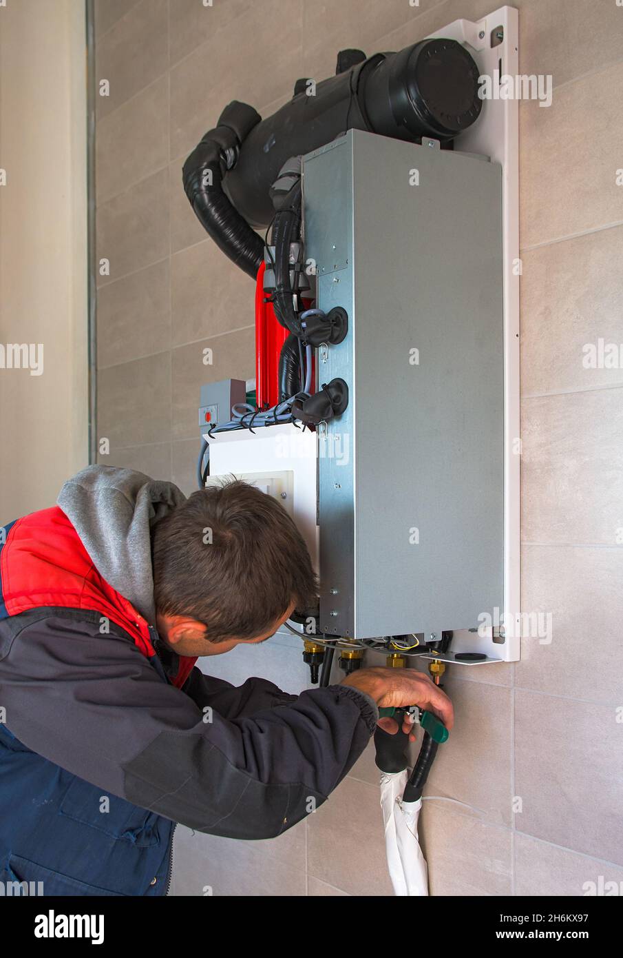 Installation of a heat pump in a residential building Stock Photo - Alamy