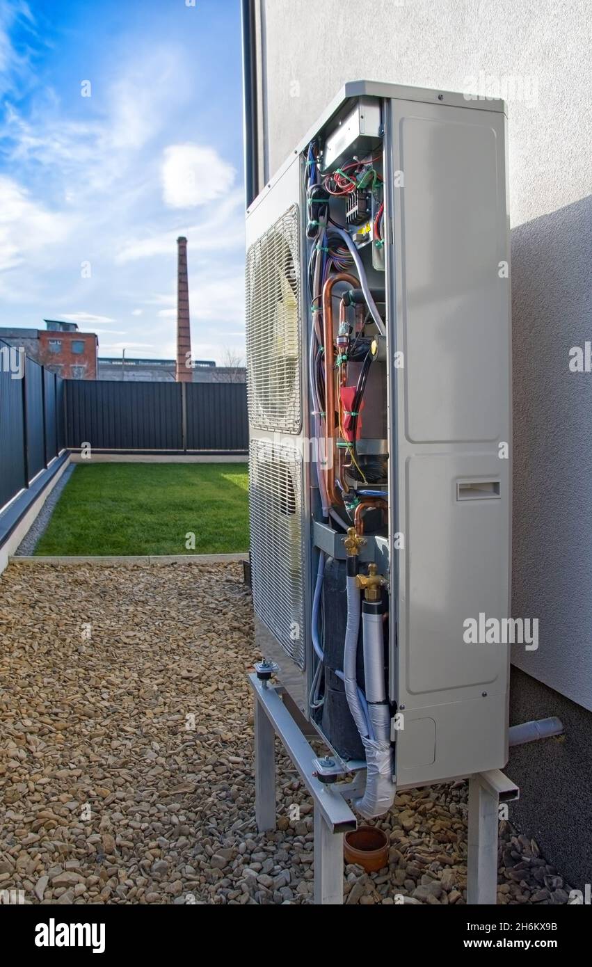 Installation of a heat pump in a residential building Stock Photo - Alamy