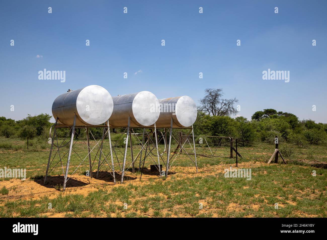 Three large metal fuel containers in the African bush Stock Photo - Alamy
